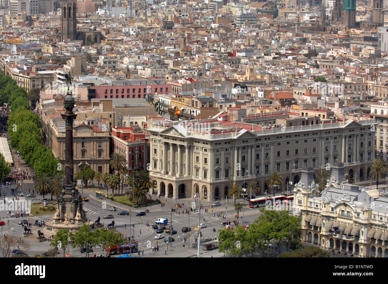 Christopher Columbus column and statue with backdrop of Barcelona city ...