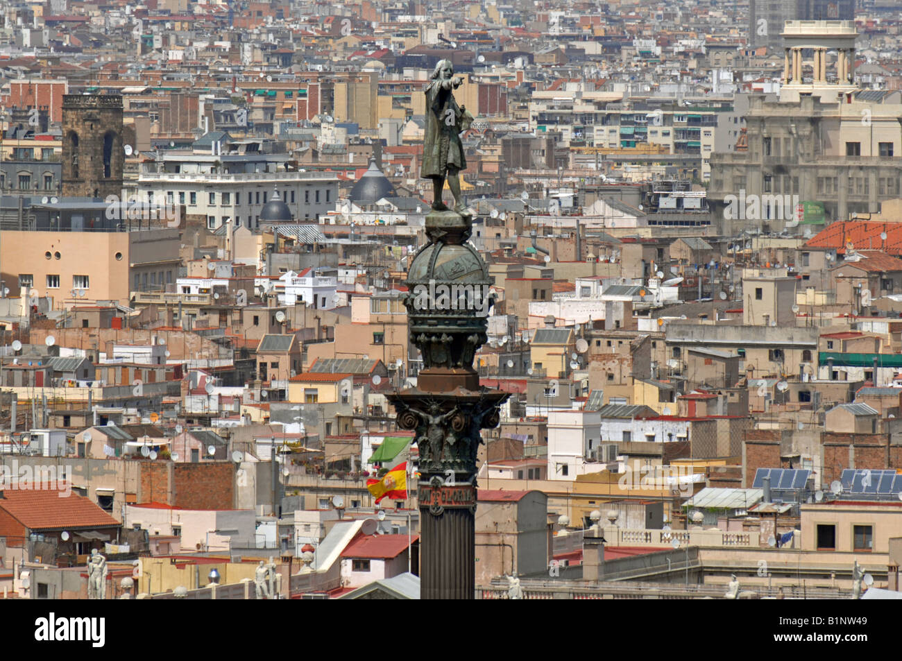 Christopher Columbus column and statue with backdrop of Barcelona city ...