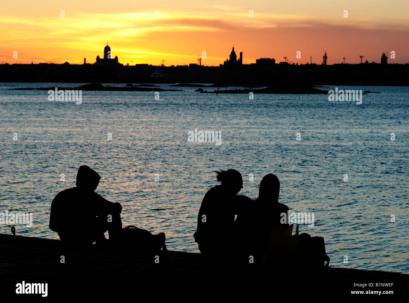 Young people and Helsinki skyline as seen from Suomenlinna island on ...