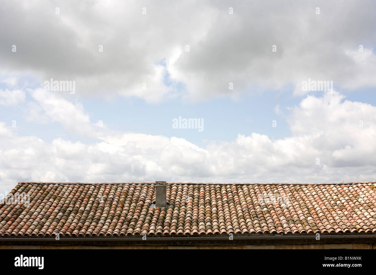 European tile roof with white clouds and blue sky back ground Stock ...