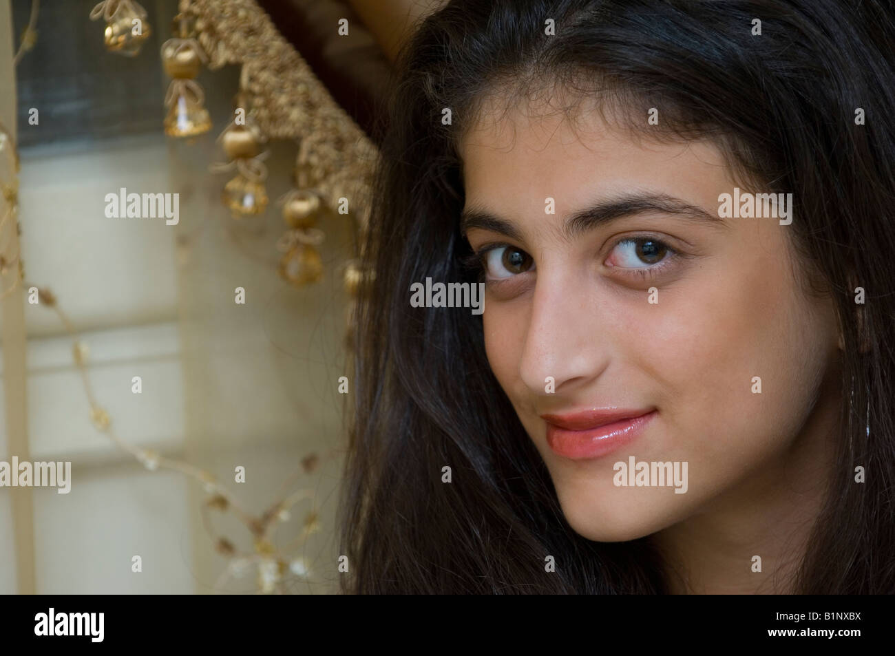 Beautiful Arabic teenage girl face Stock Photo - Alamy