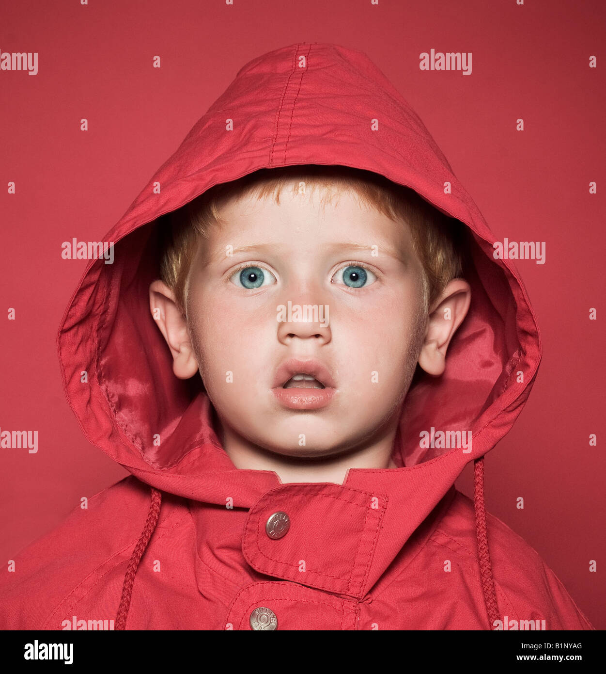 Boy Red Coat High Resolution Stock Photography and Images - Alamy