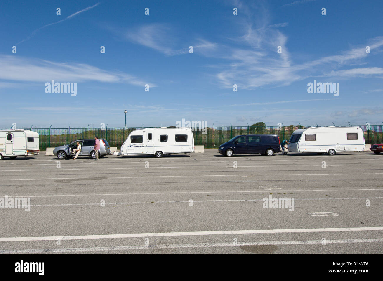 Vehicle & caravan waiting for ferry at Dunkerque port Stock Photo - Alamy
