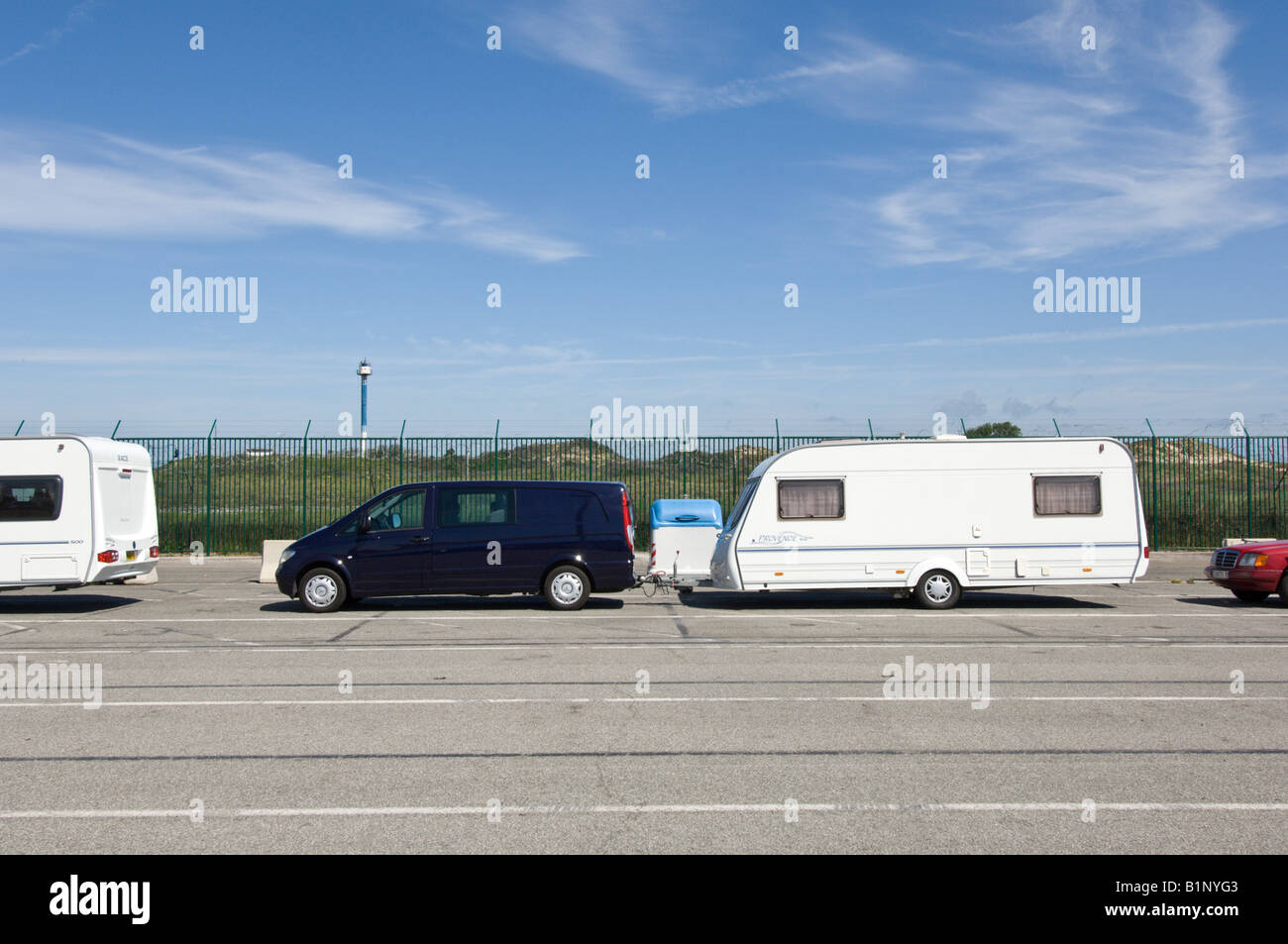 Vehicle & caravan waiting for ferry at Dunkerque port Stock Photo - Alamy