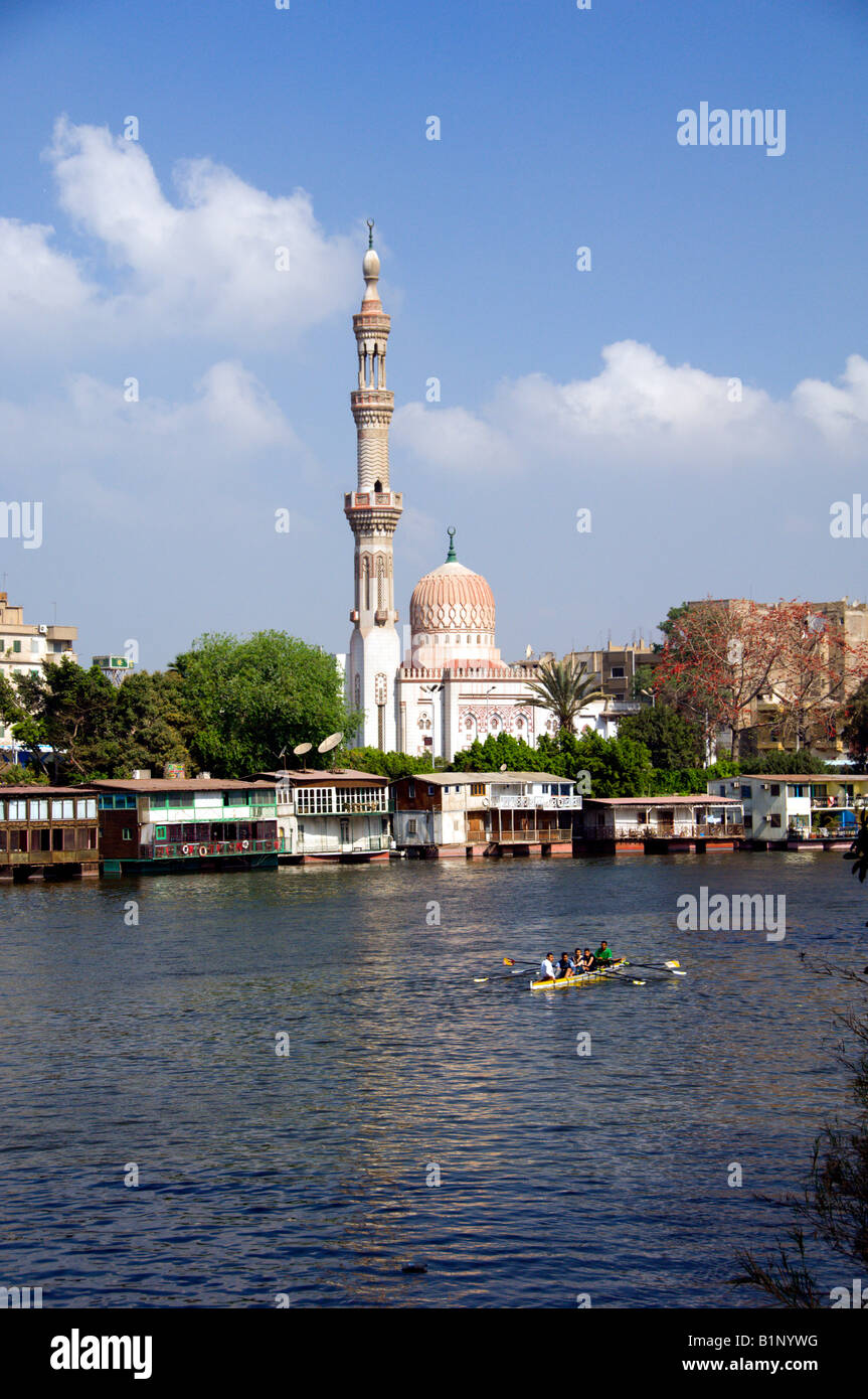A rowboat or shell with a mosque on the Nile River in Cairo Egypt Stock ...