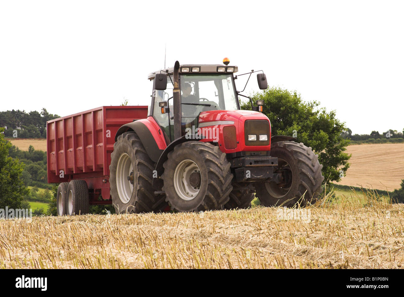 Tractor and trailer on a U.K. farm Stock Photo - Alamy