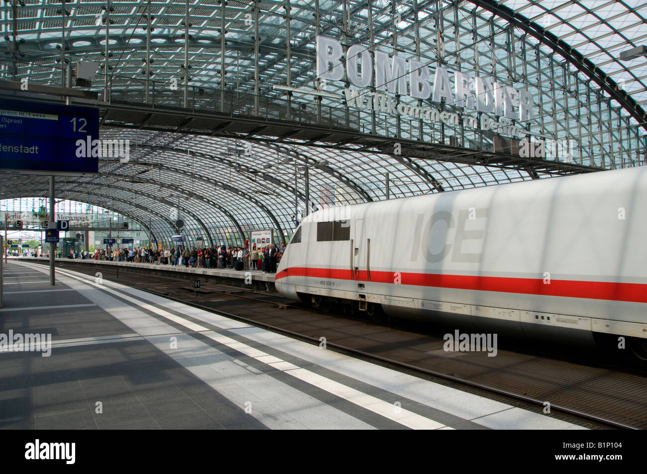 ICE High Speed train enters upper ground level platform of the Berlin ...