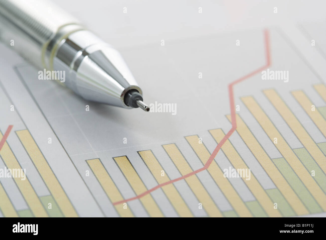 pen on graph focus on the tip of the pen Stock Photo - Alamy