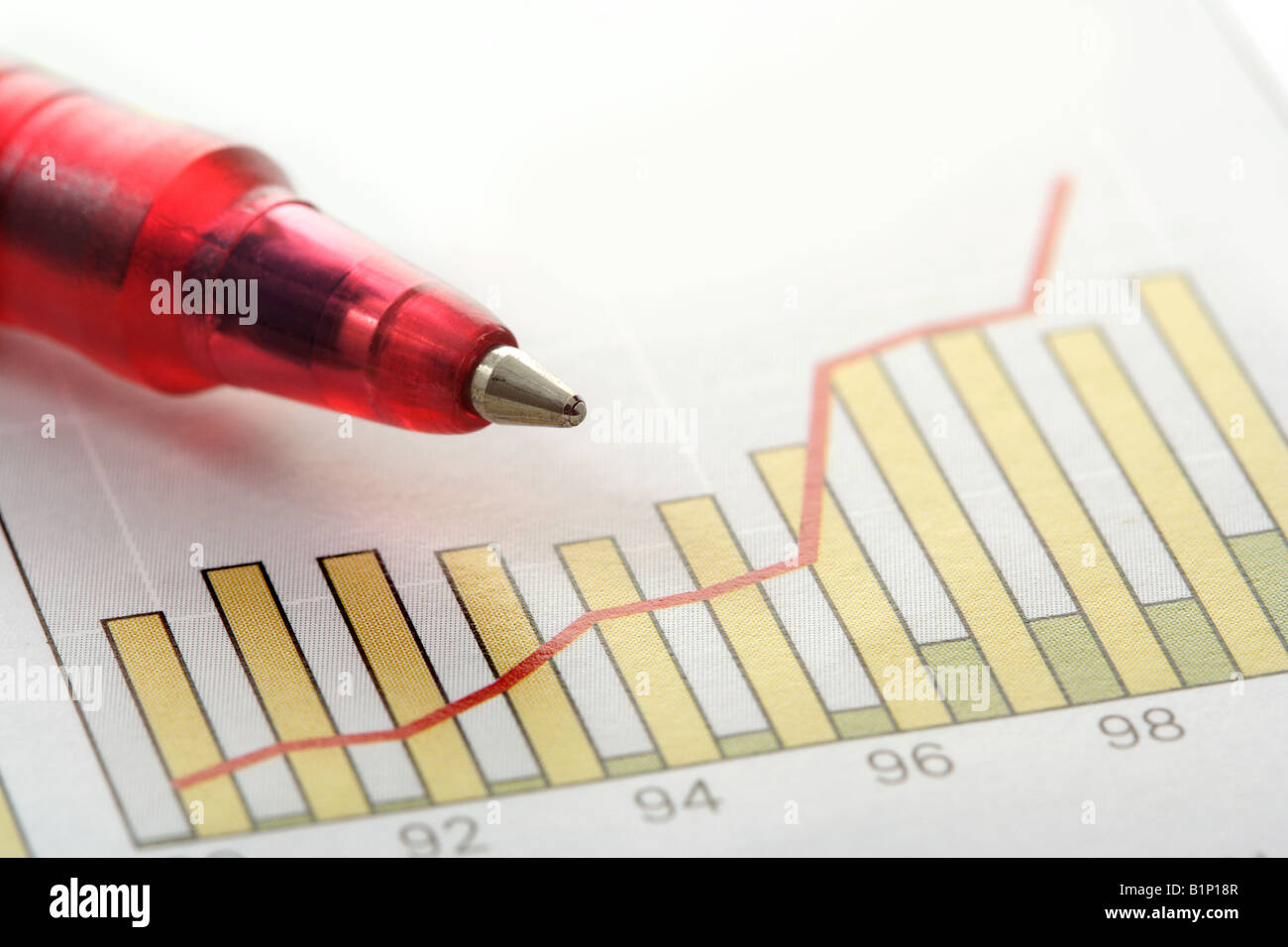 Pen on Graph focus on the tip of pen Stock Photo - Alamy