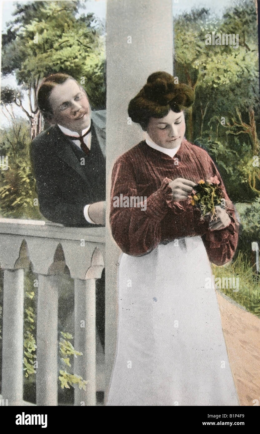 Victorian romance loving couple circa 1908 hand tinted photograph ...