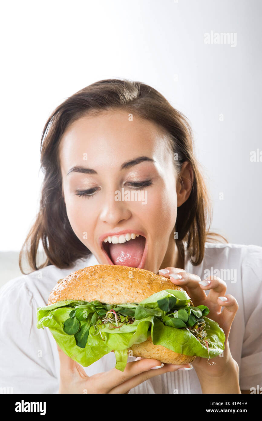 Girl with sandwich Stock Photo - Alamy