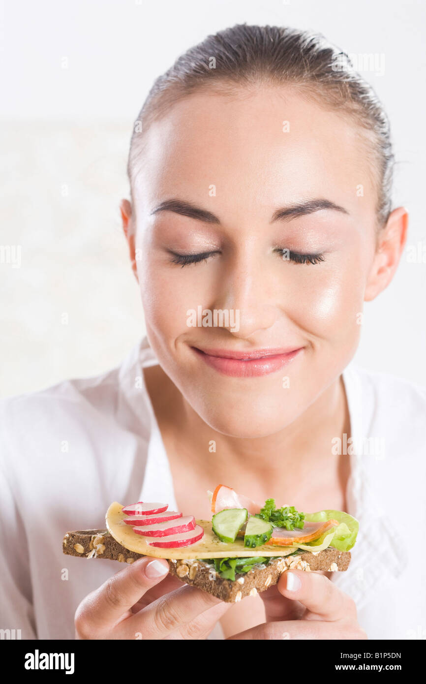 Young woman with sandwich Stock Photo - Alamy