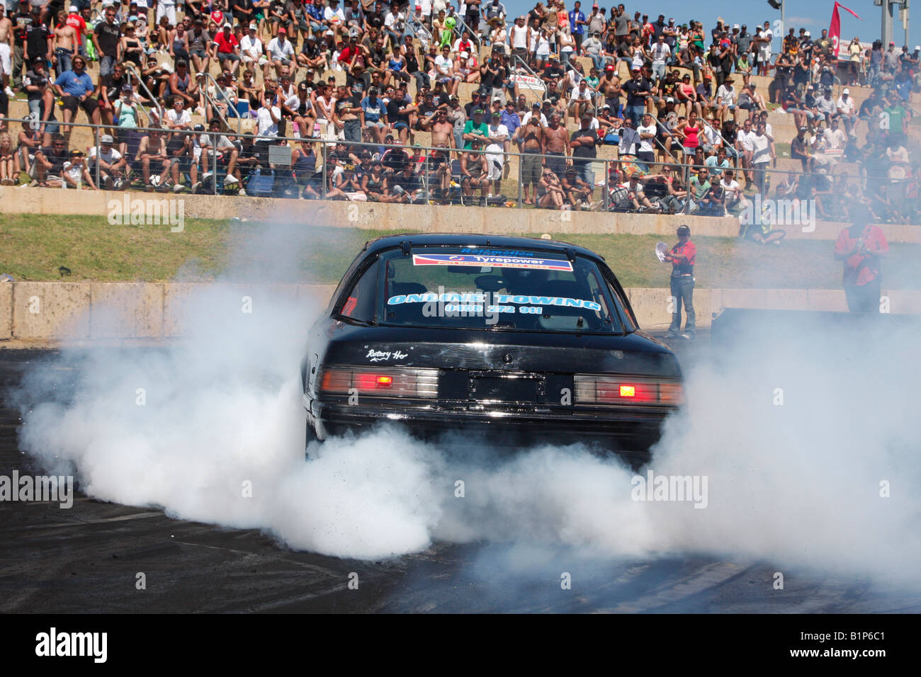 Mazda RX7 performing burnout at an Australian summer car show Stock ...