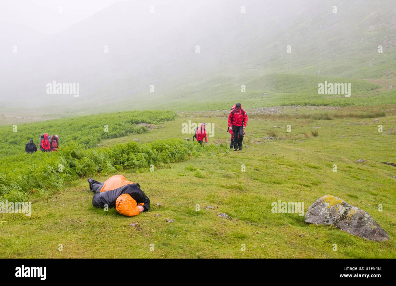 Members of Langdale Ambleside mountain rescue Team approach a collapsed ...