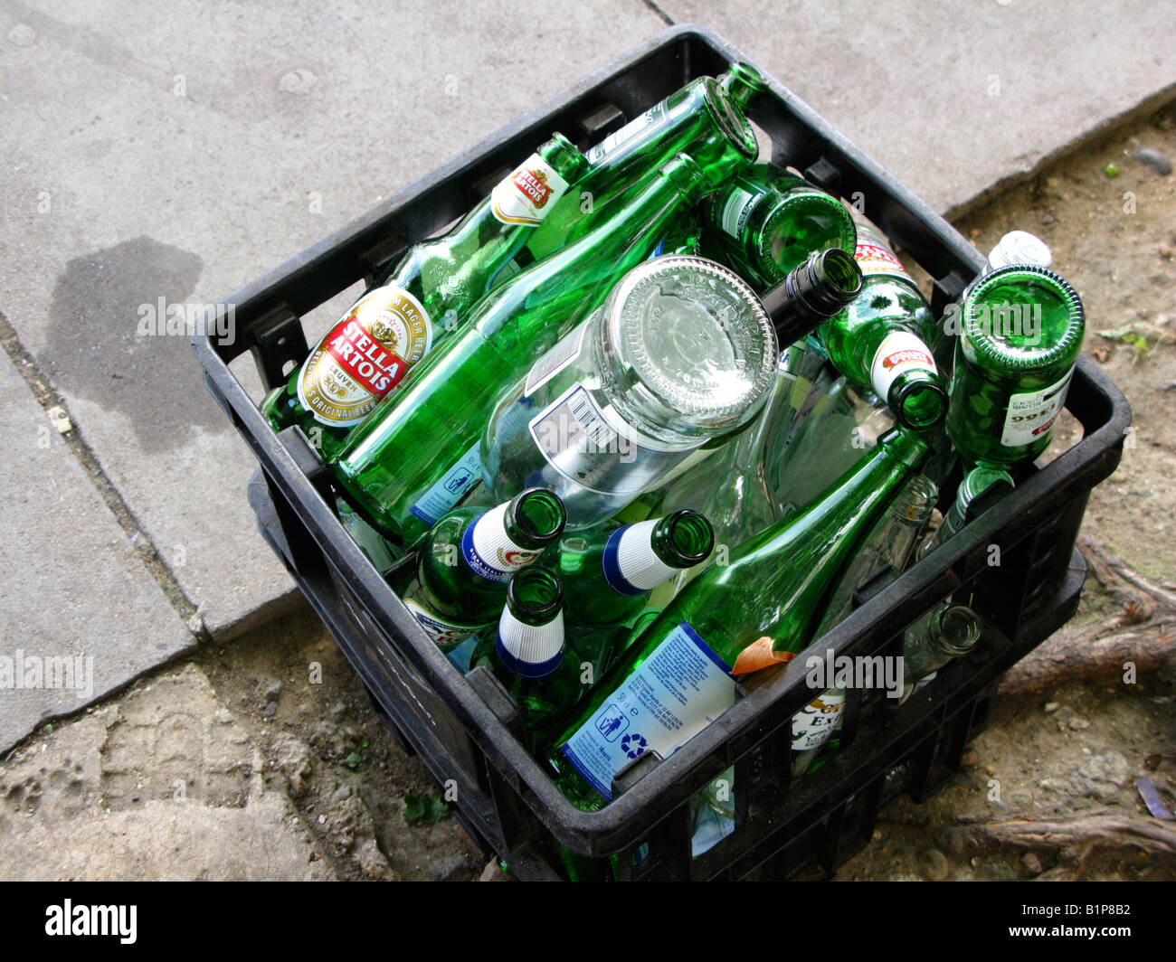 Crate with glass bottles for recycling Stock Photo - Alamy
