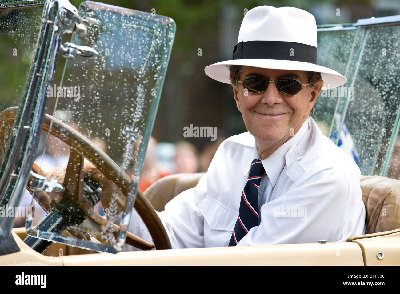 Antique car driver at the St-Jean-Baptiste celebrations Stock Photo - Alamy