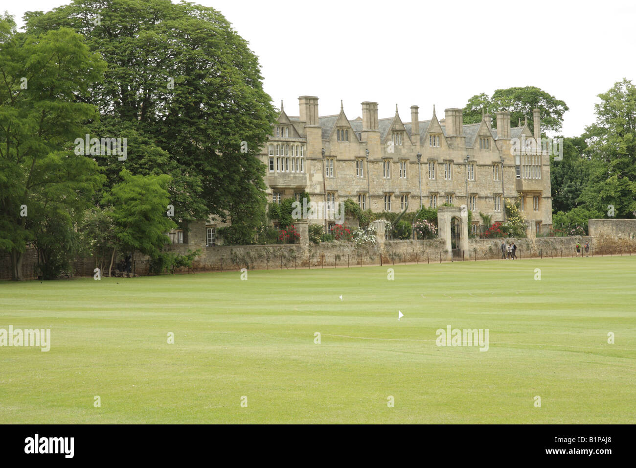 Green in front of an old building Stock Photo - Alamy