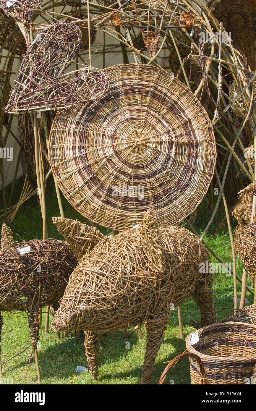 wicker designs on display at a garden festival stall Stock Photo - Alamy