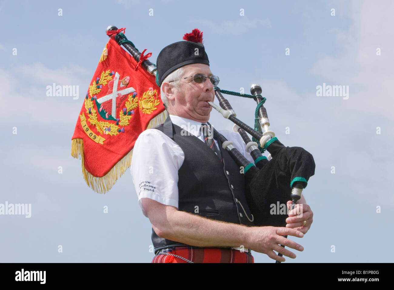 A bag pipe player Stock Photo - Alamy