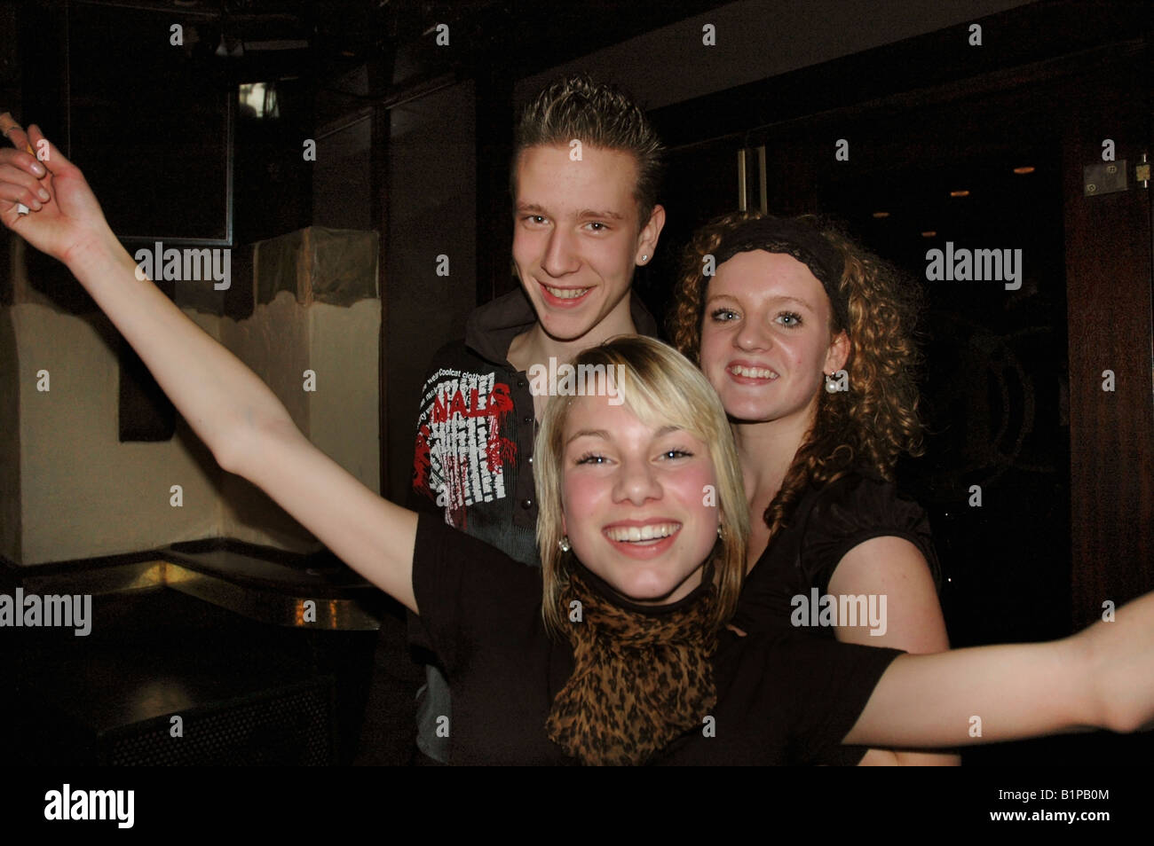 teenagers having fun at disco Stock Photo - Alamy