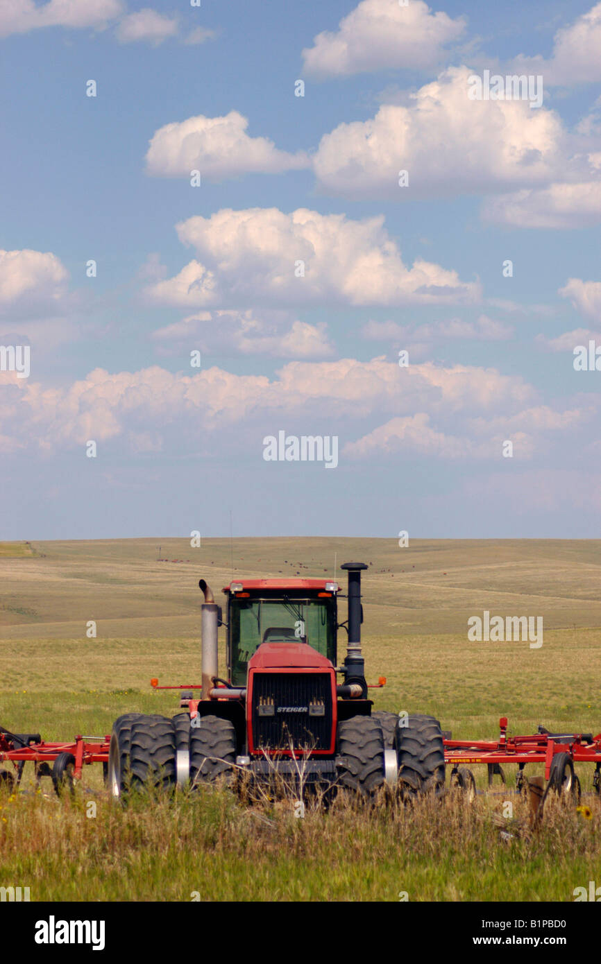 Tractor in field, Kansas Stock Photo - Alamy