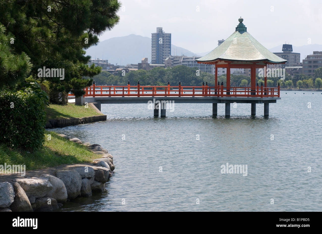 Pagoda with bridge over lake at Fukuoka's Ohori Park Stock Photo - Alamy