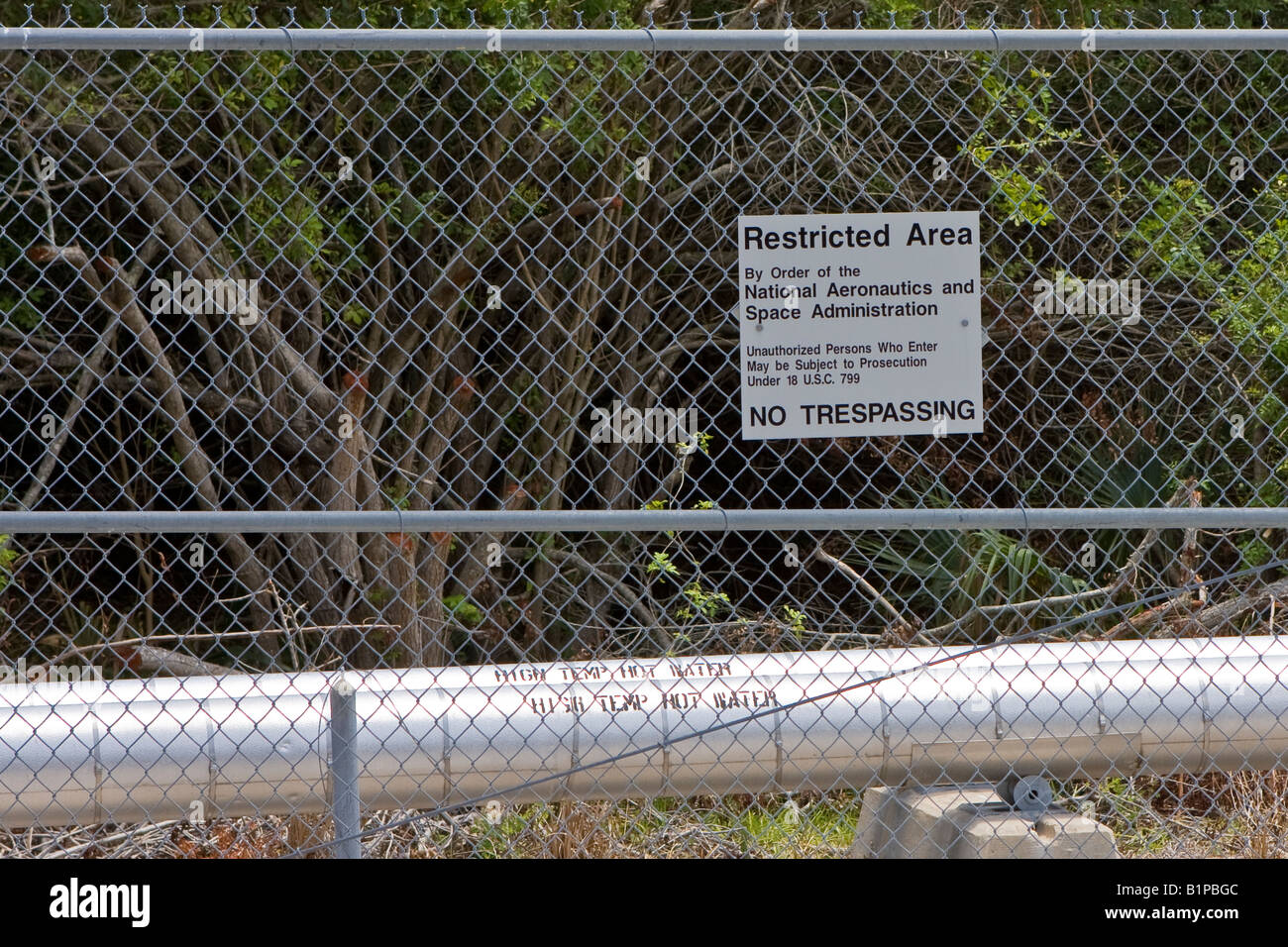 Restricted Area No trespassing by order of NASA Sign on the Perimeter ...