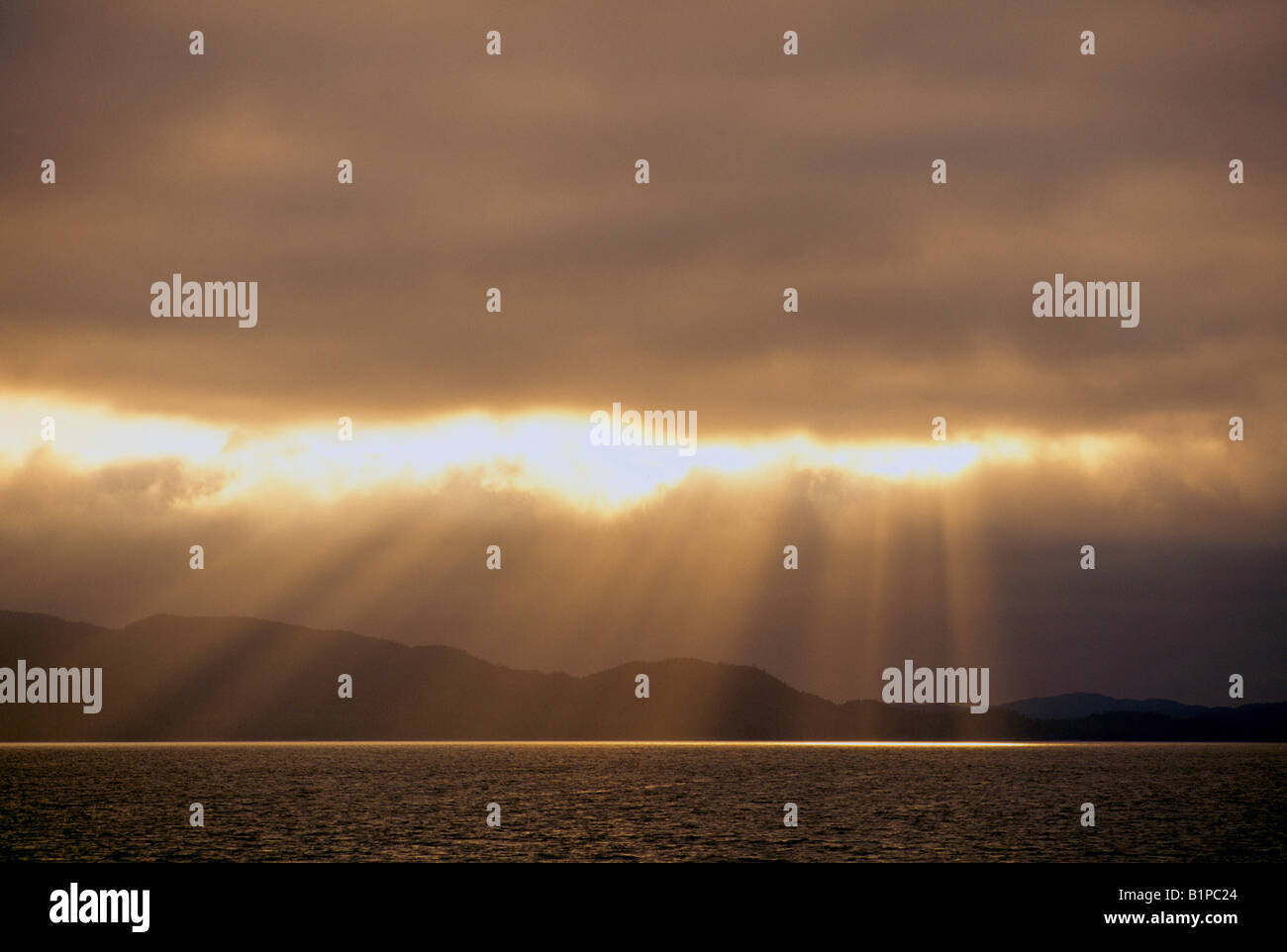 Sun Rays / Beams breaking through Heavy Clouds over Pacific Ocean, West ...