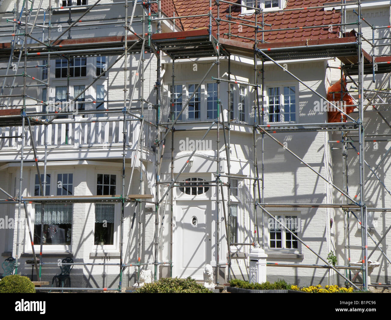 luxury house covered in scaffolding Stock Photo - Alamy