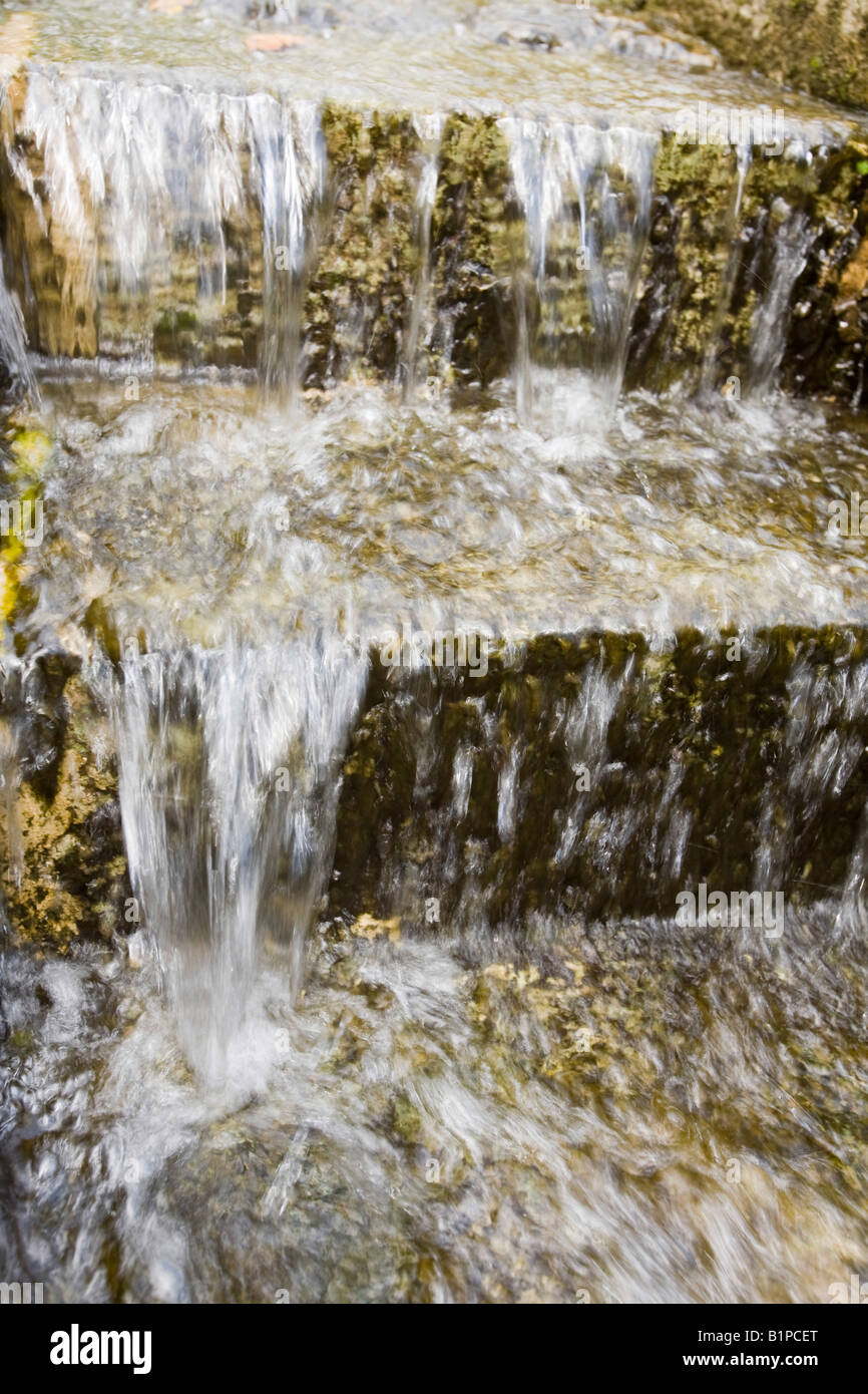 Running water in a water feature in Holker Gardens Cumbria UK Stock ...