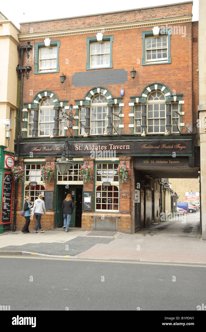 Old pub in a high street Stock Photo - Alamy