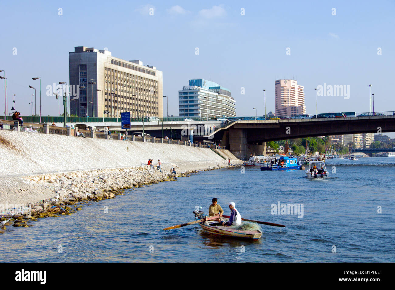 Fishermen in a small boat on the Nile River in Cairo Egypt Stock Photo ...