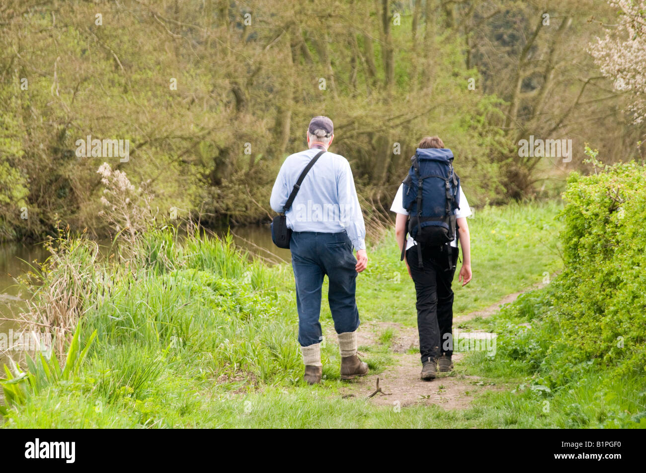 walkers on a footpath in the countryside Stock Photo - Alamy