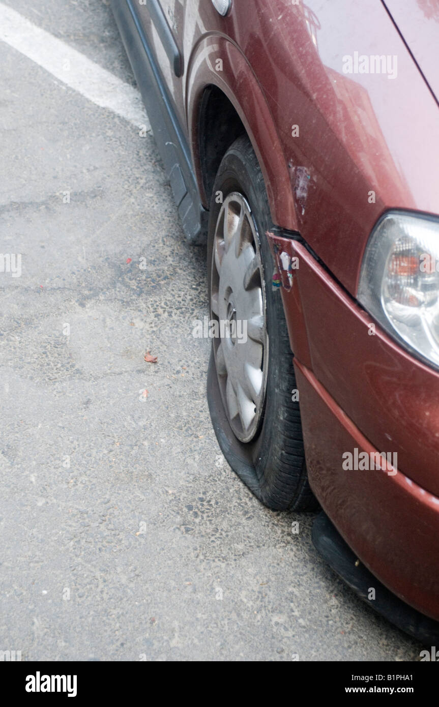 Punctured tires hi-res stock photography and images - Alamy