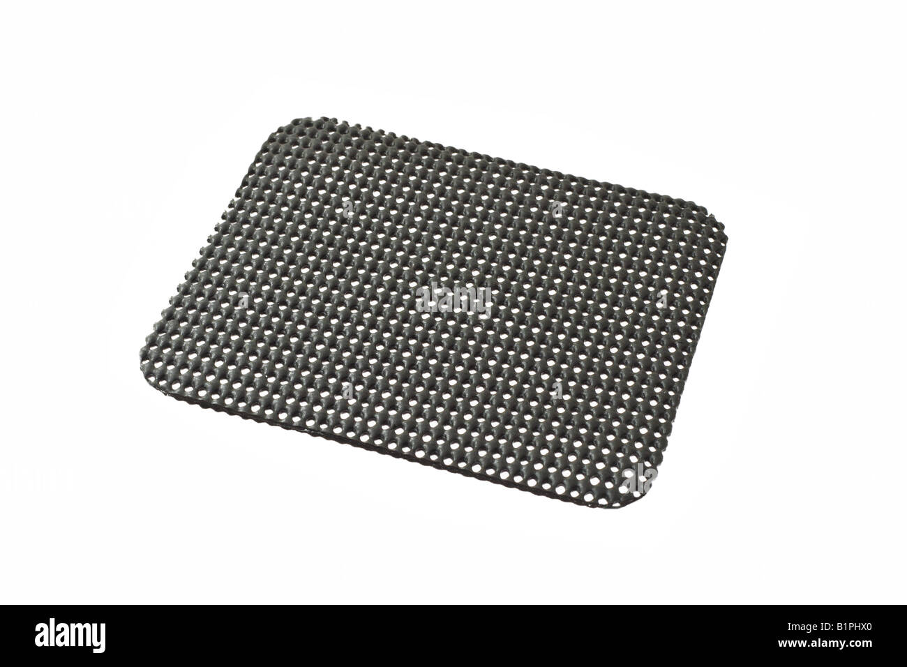 Black desktop non slip mat isolated on white background Stock Photo - Alamy