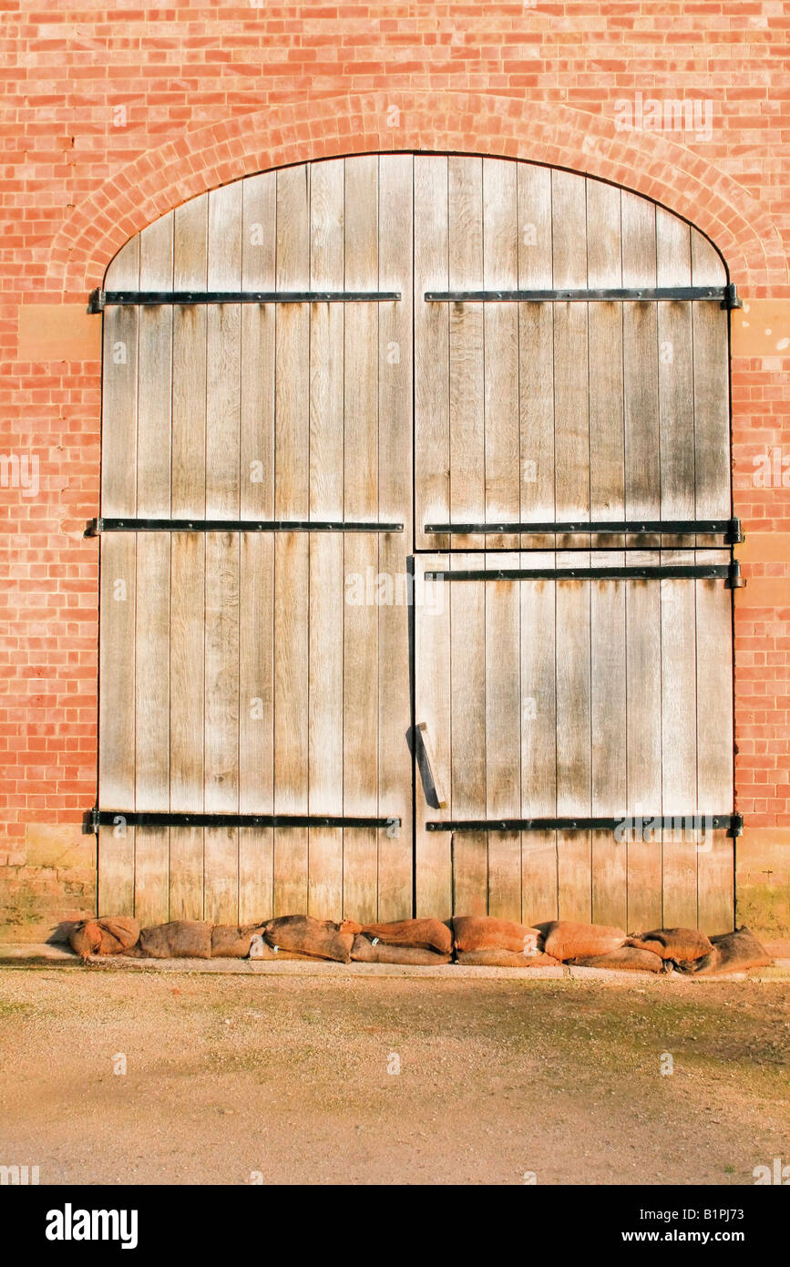 barn door on farm buildings made of wood Stock Photo - Alamy