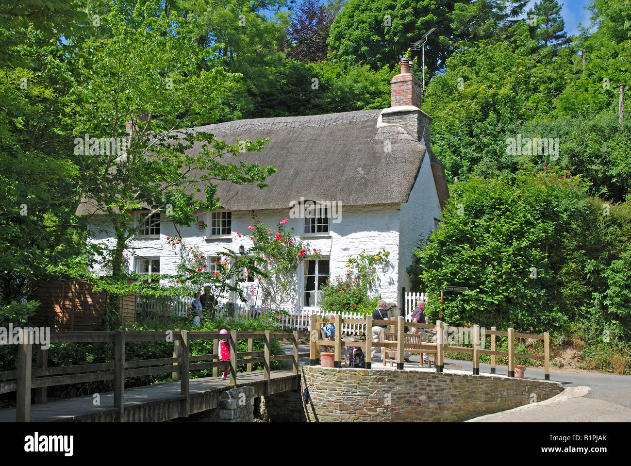 a thatched cottage in the quiet village of helford in cornwall,england ...