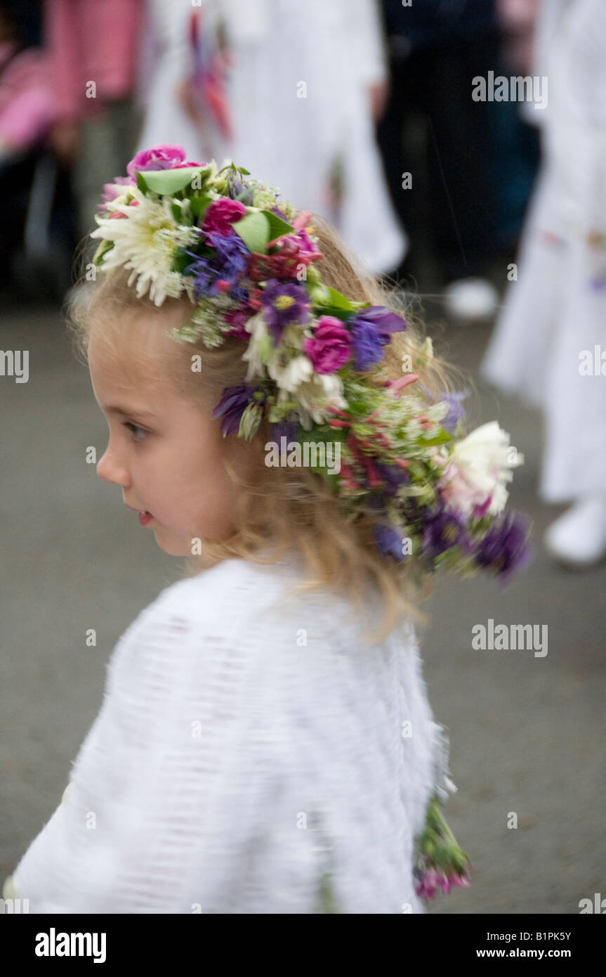 Young girl wearing flower Garland at Garlanding ceremony Castleton Peak ...