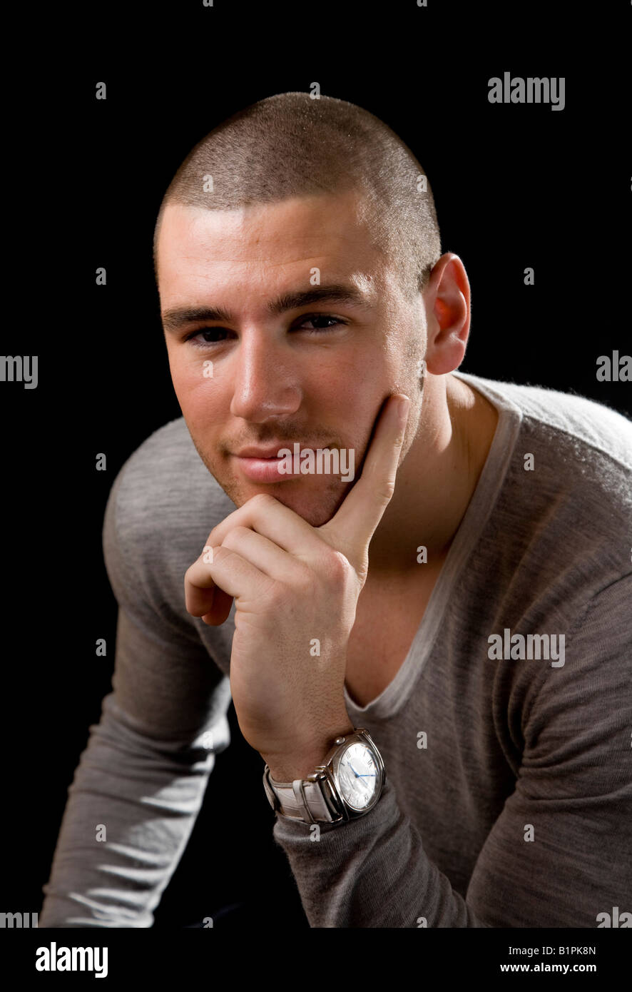Headshot young good looking man early twenties Stock Photo - Alamy