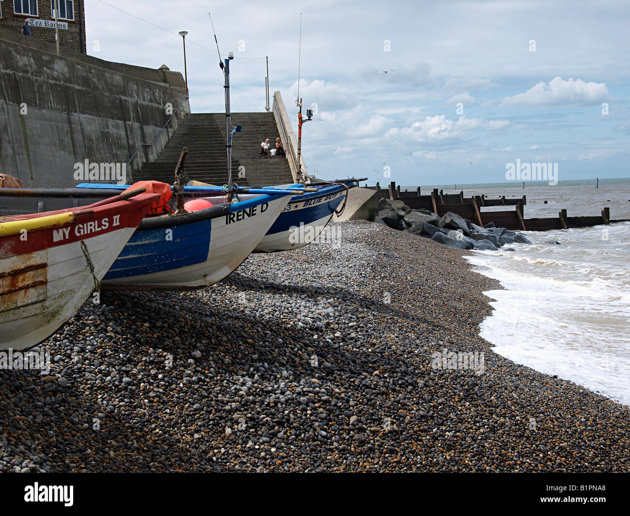 FISHING BOATS ON SHINGLE BEACH AT SHERINGHAM NORTH NORFOLK ENGLAND UK ...