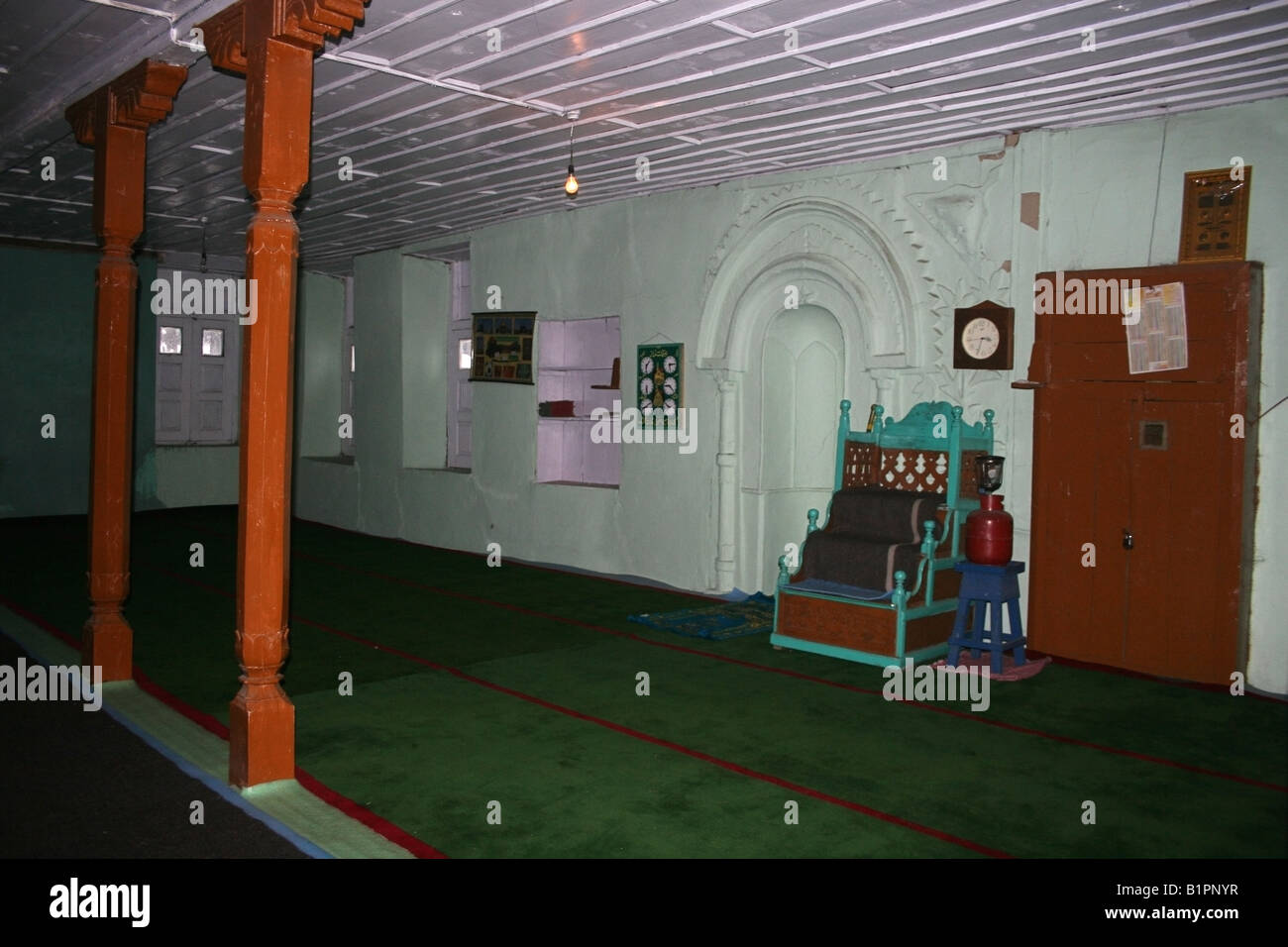 The interior of a simple mosque showing the mihrab , Gulmarg , Kashmir ...