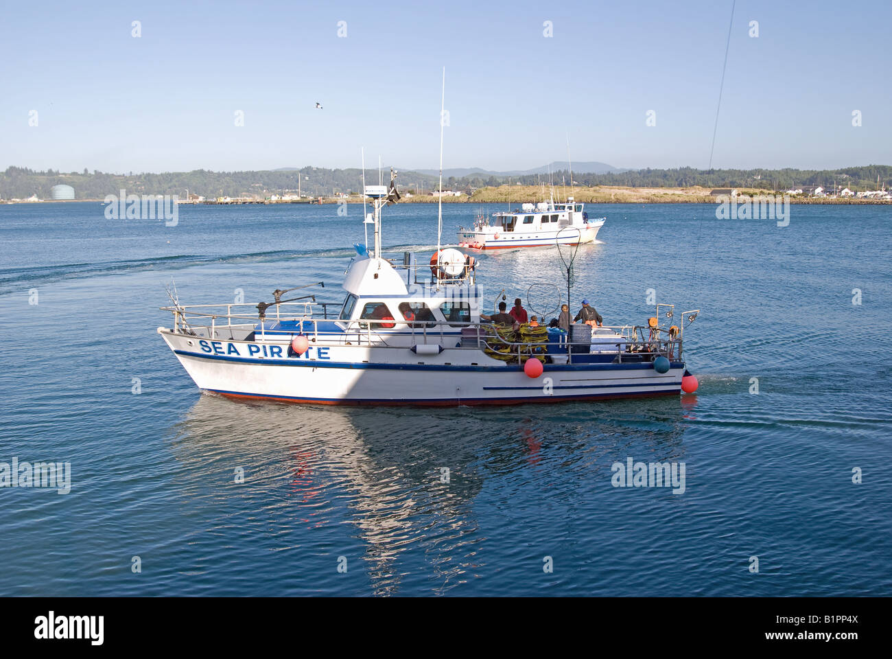 Charter fishing boat Stock Photo - Alamy