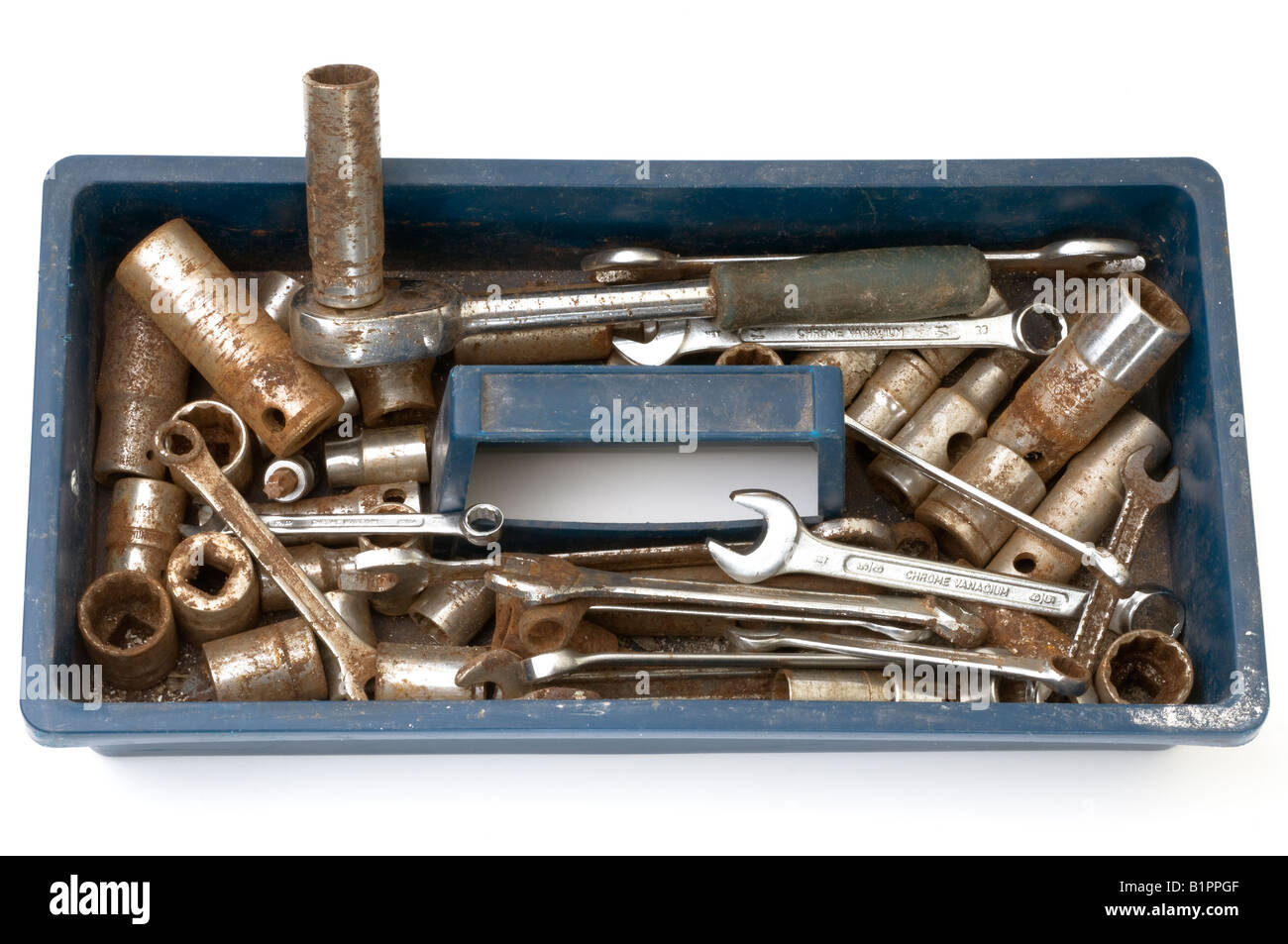A blue plastic tray of worn out rusty spanners and sockets Stock Photo ...