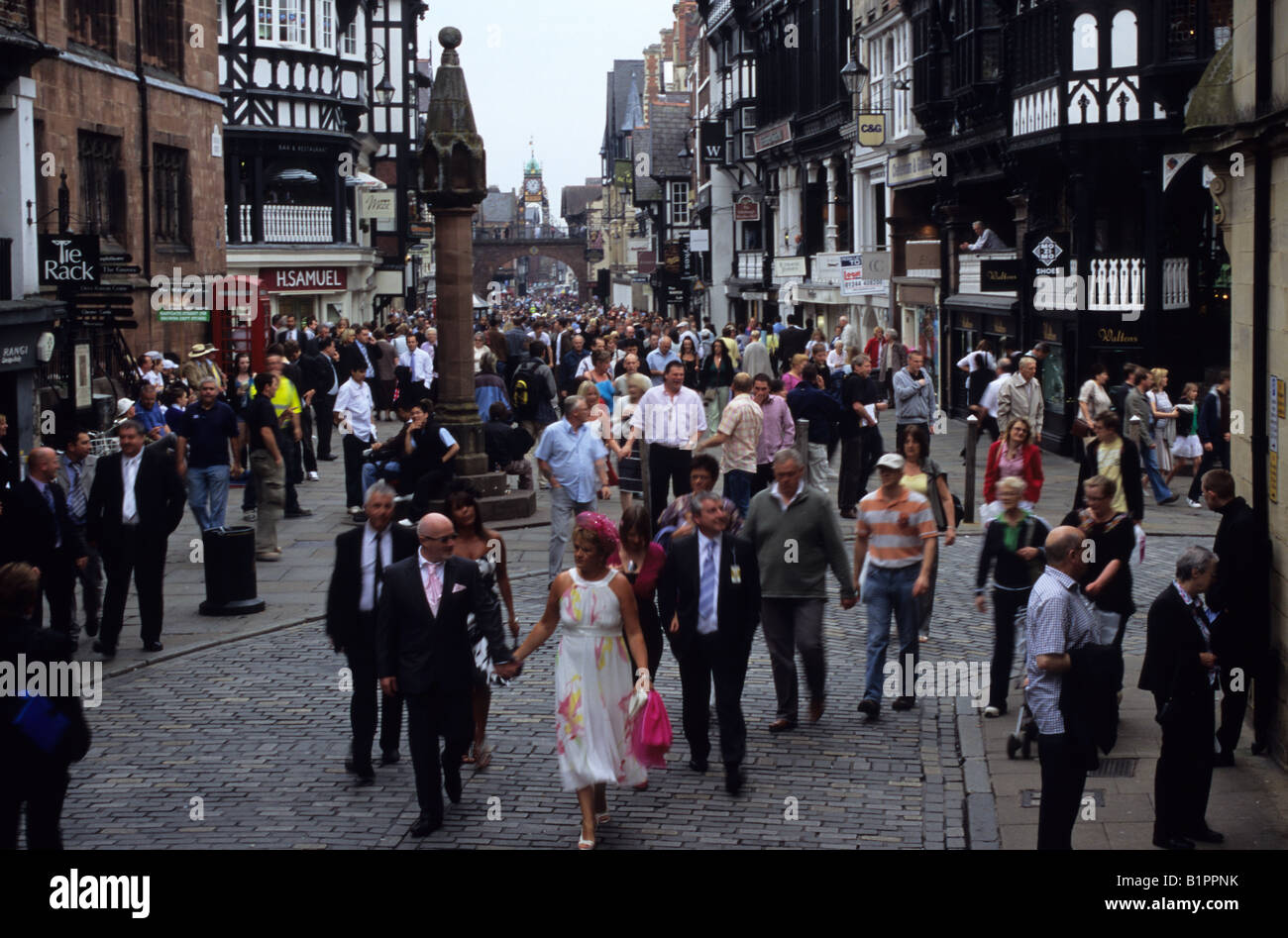 A Large Crowd Of People On Their Way To Chester Races Stock Photo - Alamy
