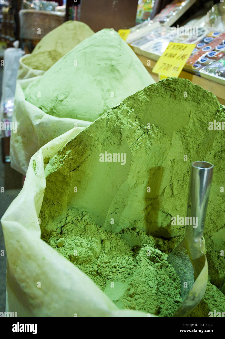 Powdered Glowing Green Tea A glowing mound of bulk green tea with a ...