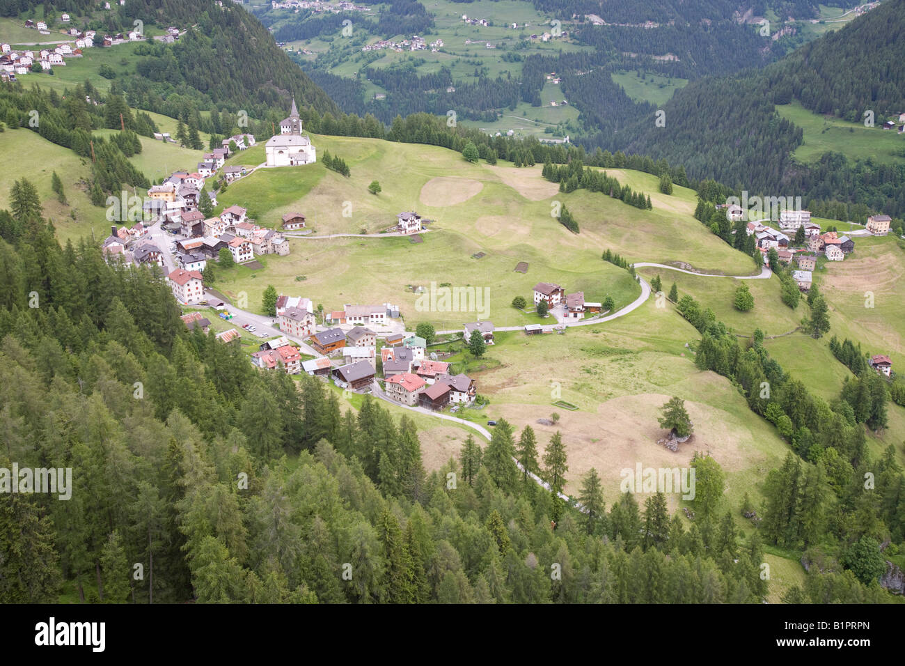 The small mountain village of Val below Arabba in the italian Dolomites ...