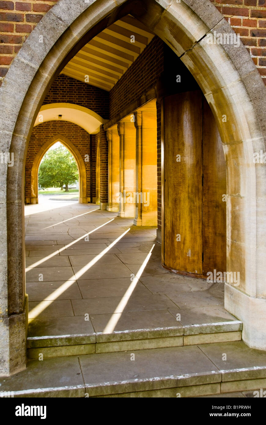 Warm sunlight shining through Cathedral walkway in Guildford, England ...