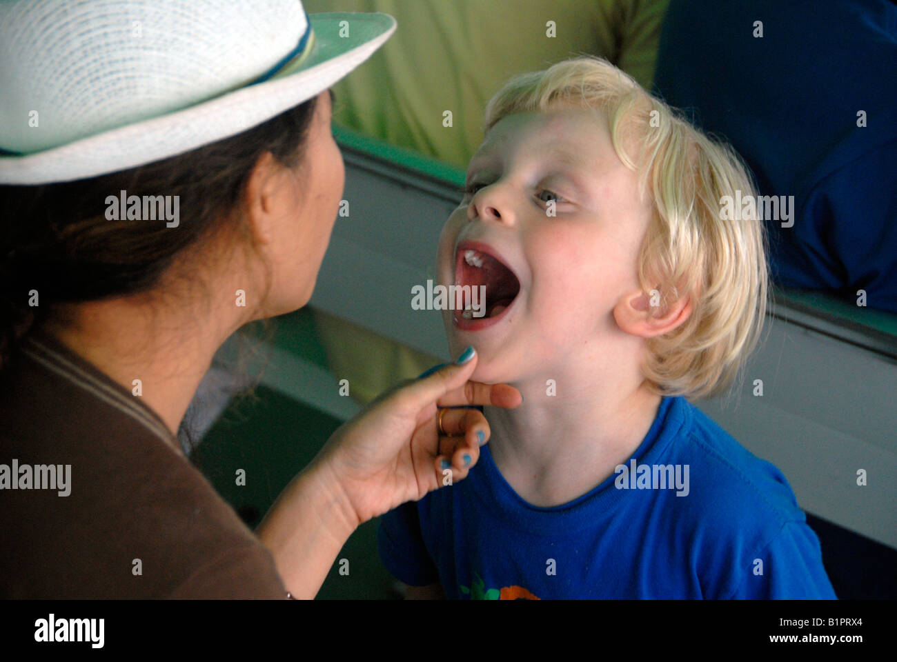 Thai girl checking Wilf's teeth, Koh Samui ferry, Gulf of Thailand ...