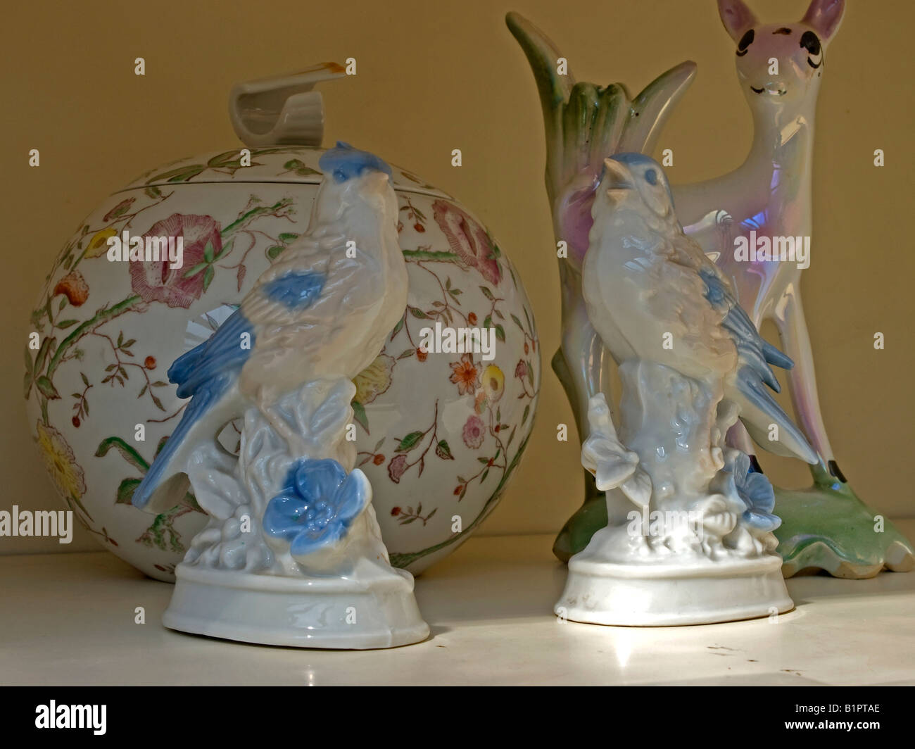 figures of birds made of china with bowl in floral design kitsch Stock ...
