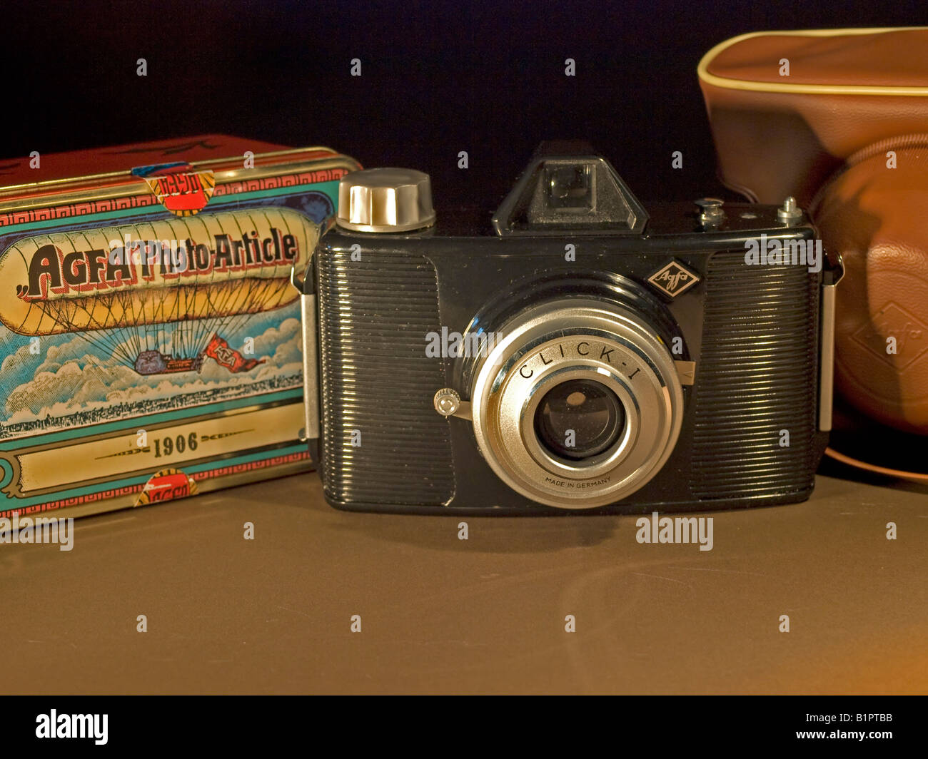 old historic tin for films with an old camera Agfa Click Stock Photo ...